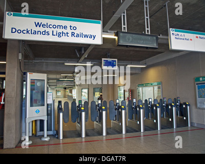 Interior of Woolwich Arsenal DLR Station showing DLR train at platform ...