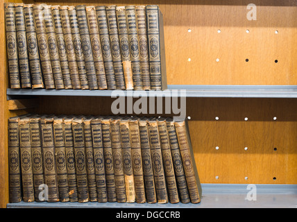 Old books on shelf. French encyclopedia. Close up shot Stock Photo - Alamy