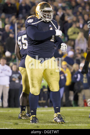 Notre Dame defensive lineman Louis Nix runs a drill at the NFL football ...