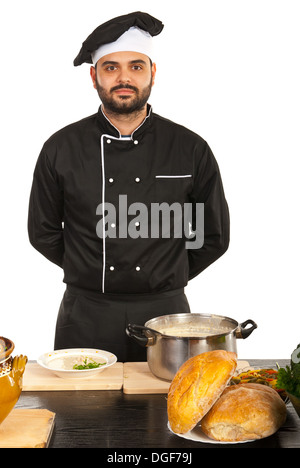 Proud cook with pot in the kitchen wearing apron , Modern housewife ...