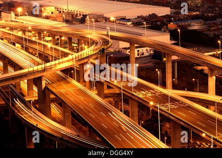 Overpass and pier at night Stock Photo - Alamy