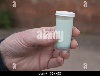 Dairy farming, National Milk Records sample tubes in farm office ...