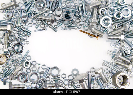 Chrome nuts and bolts closeup Stock Photo - Alamy