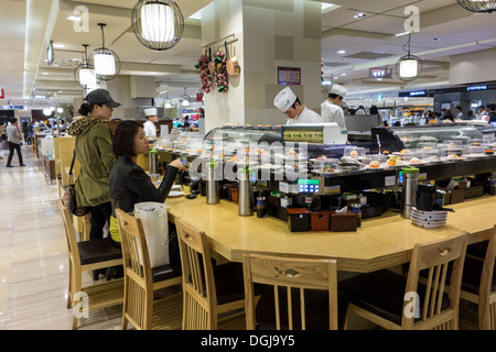 A conveyor belt sushi restaurant in Patong, Phuket, Thailand Stock ...