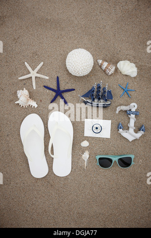 On the beach of personal items Stock Photo - Alamy