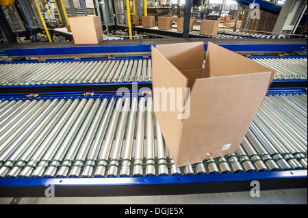 empty open cardboard box on wooden surface with empty space Stock Photo ...