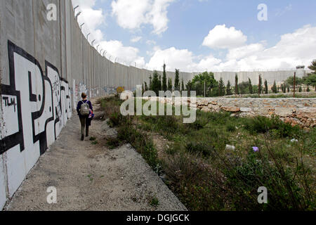 Wall with graffiti, Palestinian side, between Bethlehem, West Bank and ...