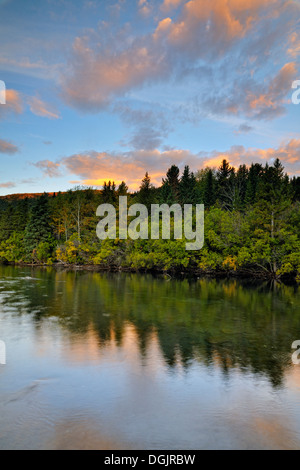 Reflections in the Chilko River in early autumn Chilcotin Wilderness ...