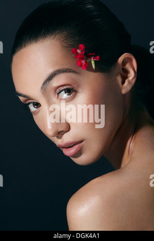 woman looking over shoulder Stock Photo - Alamy