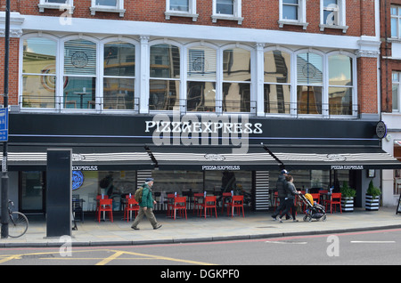 People eating a meal at Pizza express restaurant O2 arena, london UK ...