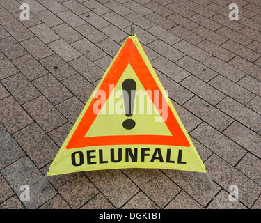 Warning sign oil spill Stock Photo - Alamy