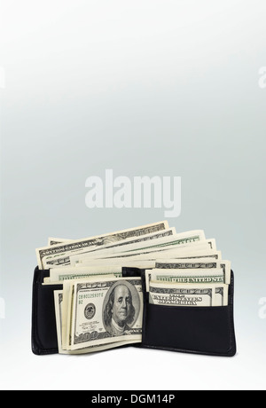 full wallet with american dollars Stock Photo - Alamy