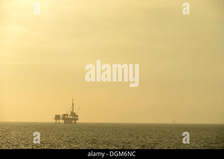Offshore oil rig off Huntington Beach, sunset, California, United ...