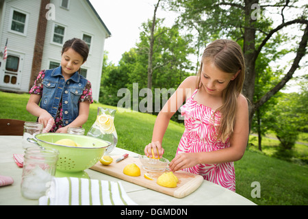 positive european family with two girls outdoors in sunny fall day ...