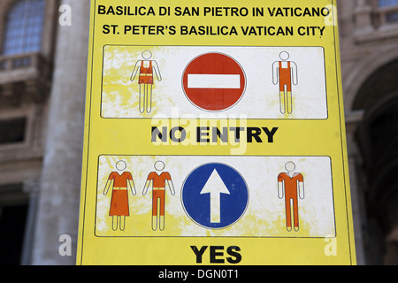 A sign with the dress code at St. Peter's Basilica, Vatican City Stock ...