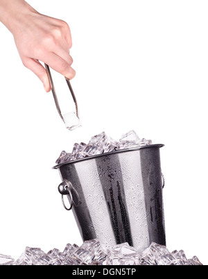 ice bucket with hand holding Ice tongs isolated on a white background ...