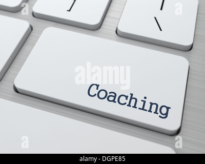 Coaching icon. Internet button on orange background Stock Photo - Alamy