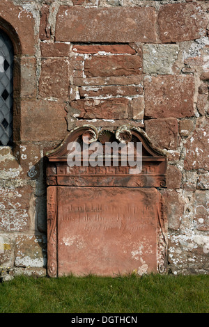 Badly eroded gravestone. Church of Saint Michael and Saint Lawrence ...