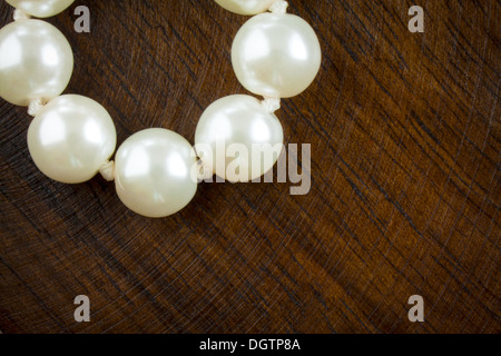 Peals in the wooden box Stock Photo - Alamy