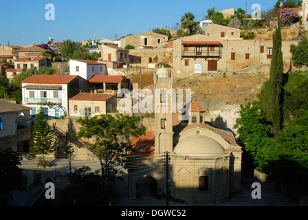 A mountain village church and village houses in the Alps in Switzerland ...