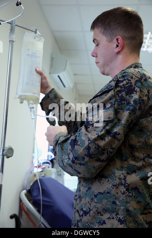 Hospitalman Third Class Michael Boeji, a corpsman with Black Sea ...