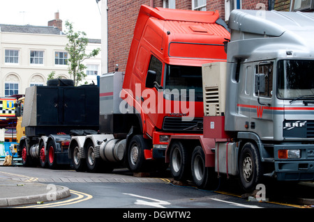 Fairground lorries parked at Warwick Mop fair Stock Photo - Alamy