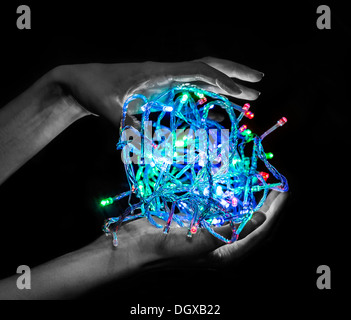 Hands holding light bulbs Stock Photo - Alamy