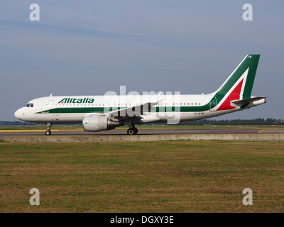 The Alitalia Airbus A320-216, registered EI-DTD, is shown landing at ...