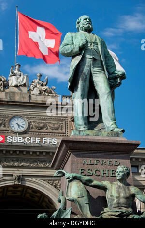 Swiss flag behind monument to Alfred Escher, Swiss politician, business ...