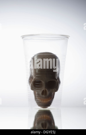 human skull toy in front of white background Stock Photo - Alamy
