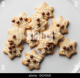 Chocolate cookies with icing drizzle Stock Photo - Alamy