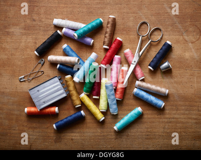 Cotton thread spool in various colors Stock Photo - Alamy