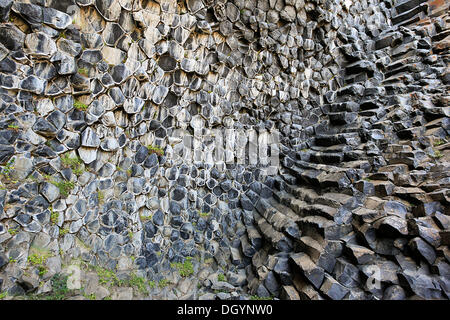 Hexagonal basalt columns, volcanic rock formations near the village Vík ...