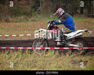 Off Road Motorcyclist Riding Dirt Bike Through Forest Trail. High ...