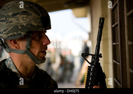 Lt. Col. Frank Hughes, 8th Civil Engineer Squadron commander, middle ...