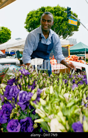 African american man working at small business ecommerce making fish ...