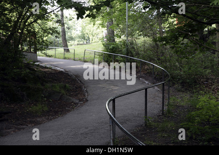Curved road with steel railings in forest in Sweden Europe Stock Photo ...