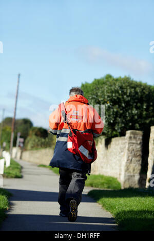 Royal Mail postman on delivery round. England, GB, UK Stock Photo ...