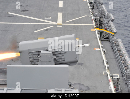 A RIM-116 Rolling Airframe Missile (RAM) is launched from the ...