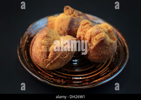 Sata andagi (Okinawan sweet deep-fried bun Stock Photo - Alamy