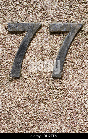 House number 77 Stock Photo - Alamy