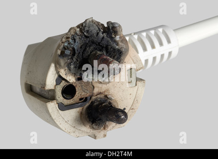 Burnt electrical plug Stock Photo - Alamy
