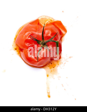 Spoiled, rotten red tomato isolated on white background Stock Photo - Alamy