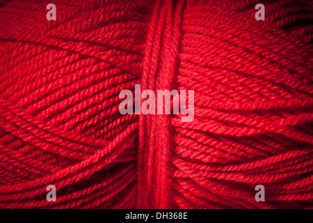 Big ball of red wool Stock Photo - Alamy