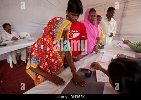 A finger mark with indelible ink at a polling station in Malaysia Stock ...