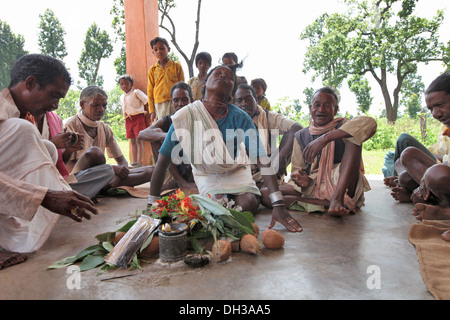 Performing naag Puja on Nagpanchami day. Baiga Tribe, Chada village ...