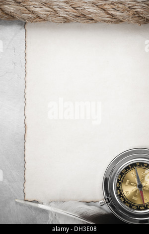 parchment and compass with ship rope Stock Photo - Alamy