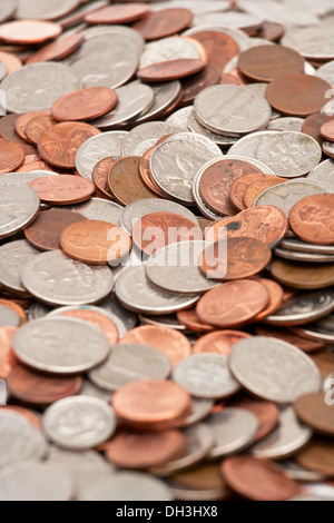 Close up of loose American coins on white background Stock Photo - Alamy
