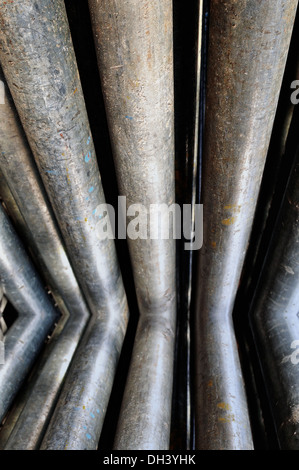 one above the other - kinked tubes Stock Photo - Alamy