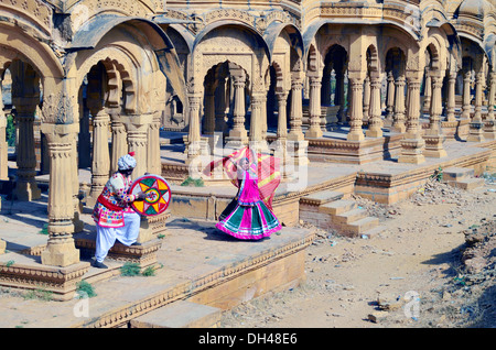 man playing musical instrument duff and woman dancing Rajasthan India ...